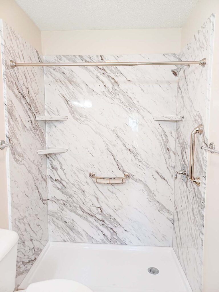 Before and After - Tub to Shower Conversion With Calcutta Stone